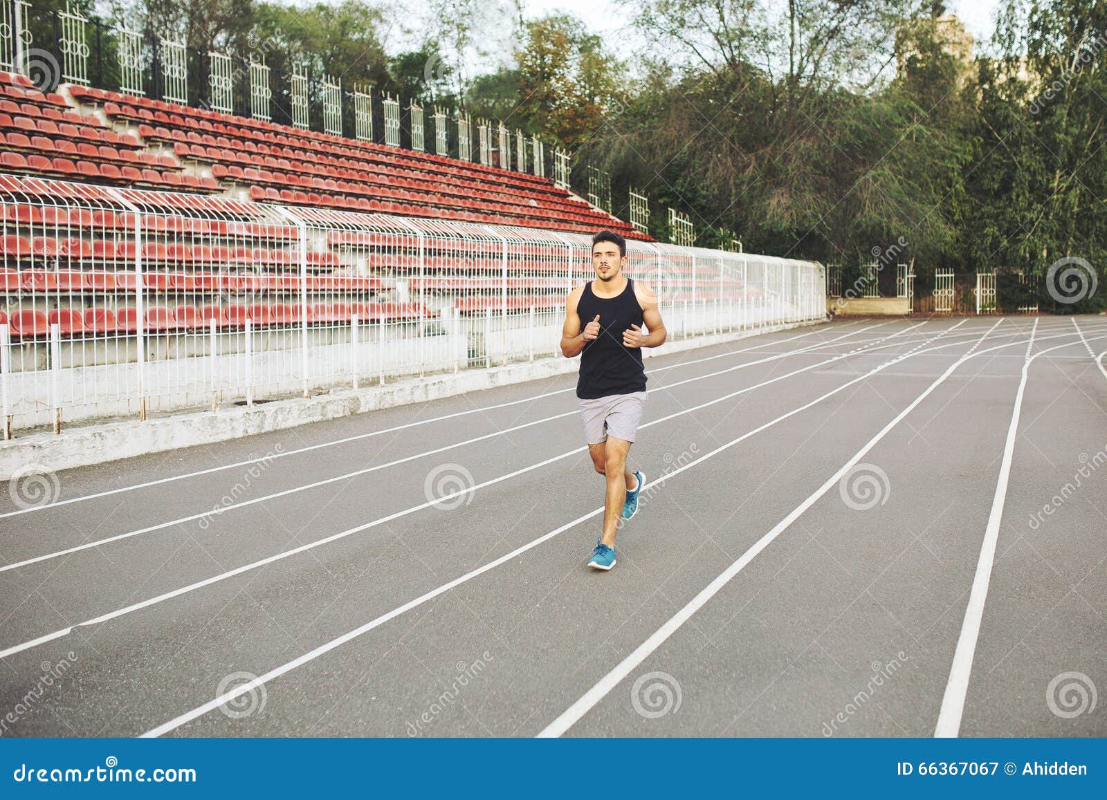 Man Running on a Racing Track Stock Image - Image of caucasian, sport ...