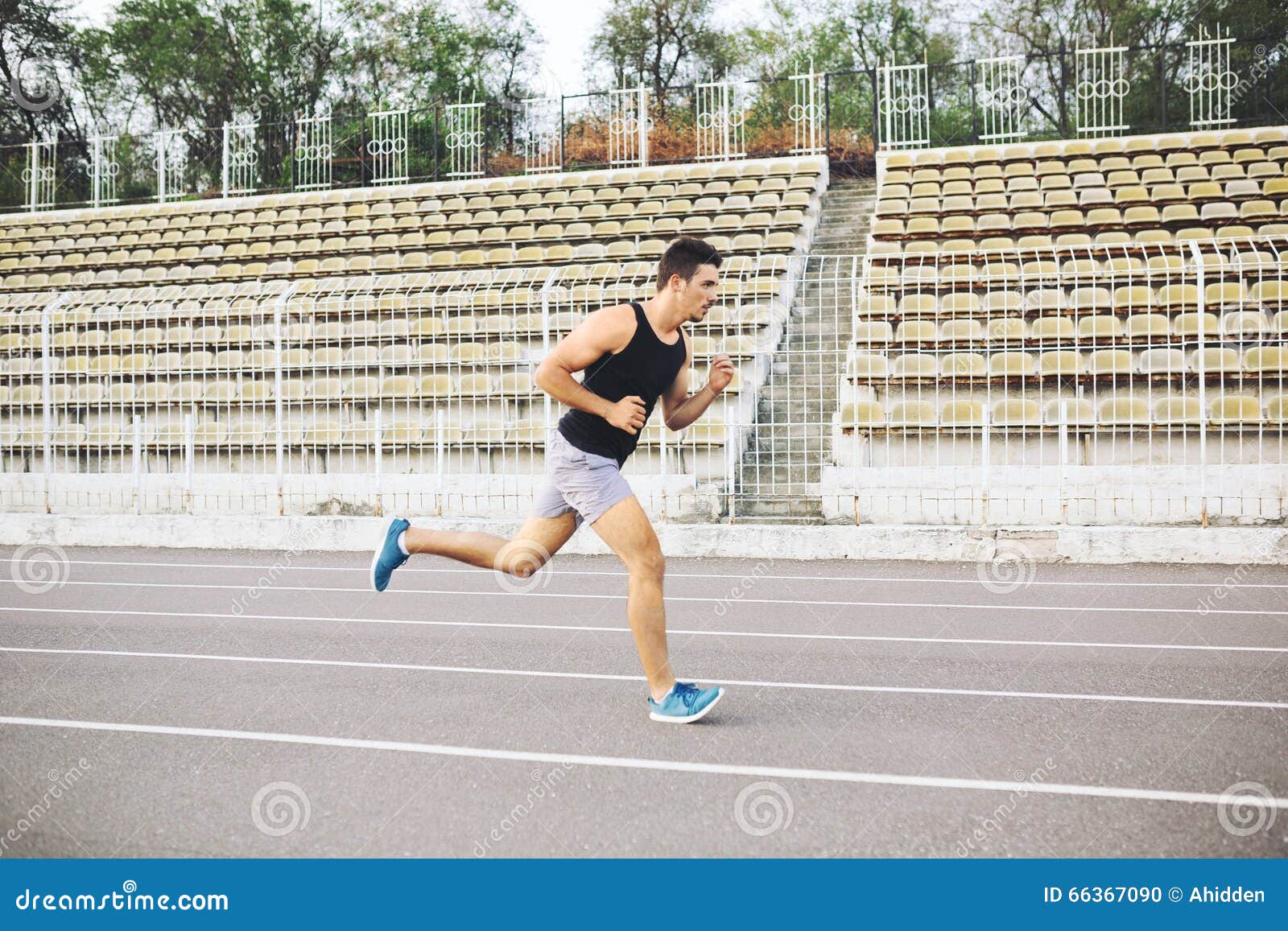Man Running on a Racing Track Stock Photo - Image of line, speed: 66367090