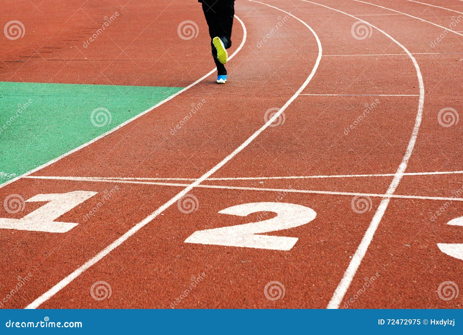 Man Running on the Red Plastic Runway in the Playground Stock Image ...