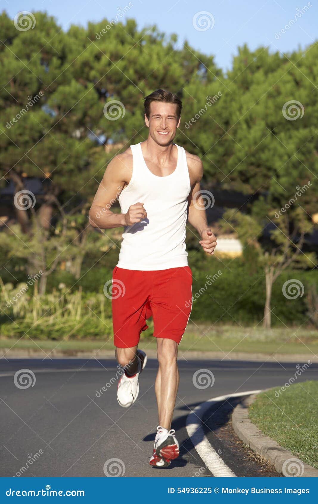Man Running on Road stock image. Image of people, vertical - 54936225