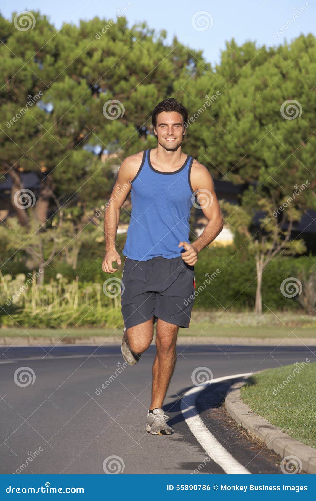 Man Running on Road stock photo. Image of exercise, athletic - 55890786