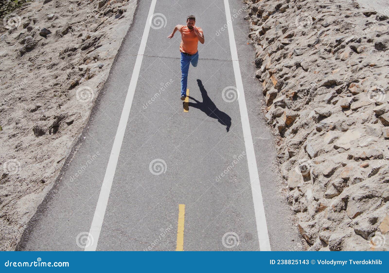 Man Running on the Road. Sporty Man Runner Running in Summer. Stock ...