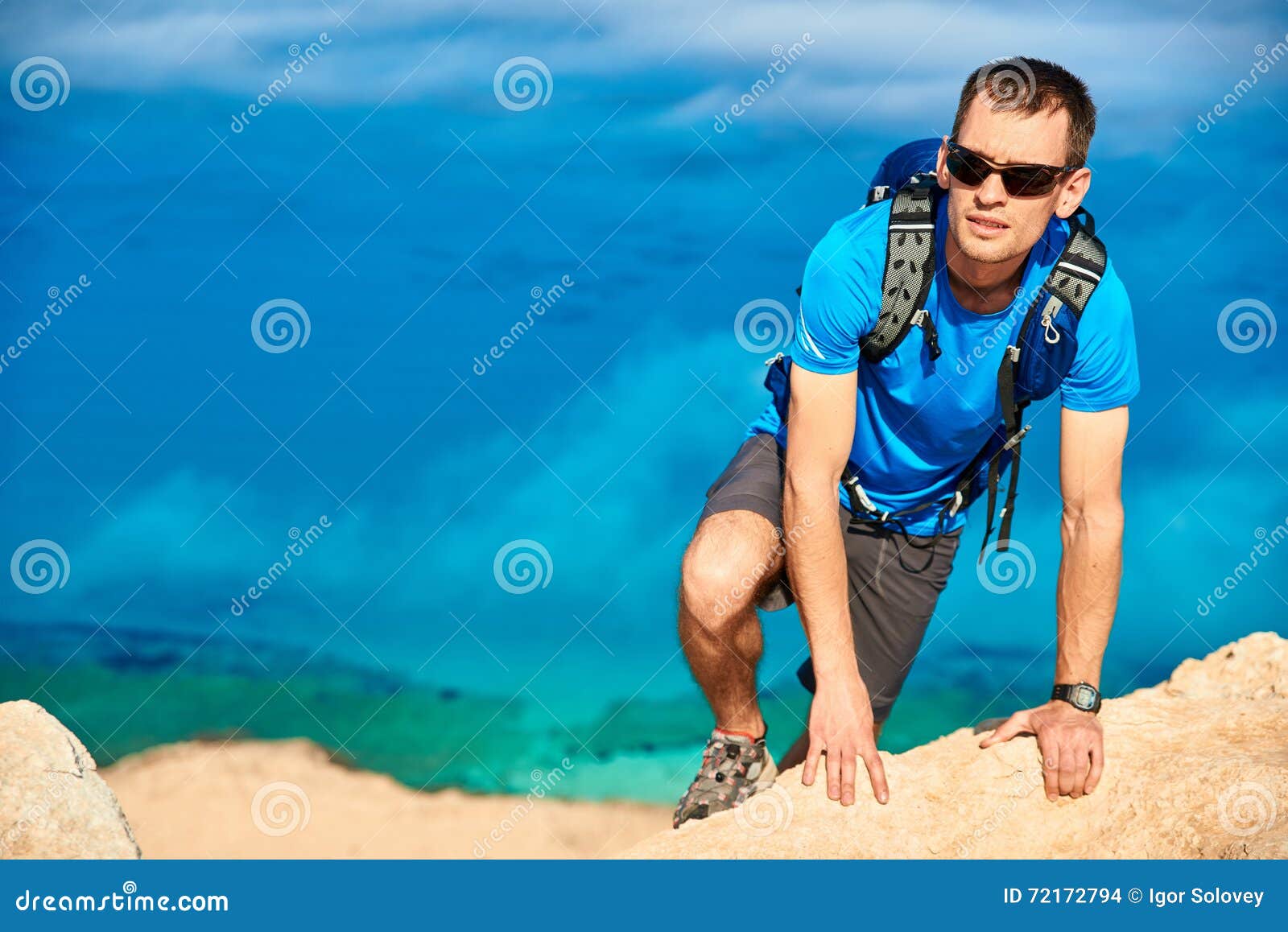 Man running on the rock stock photo. Image of blue, sportsman - 72172794