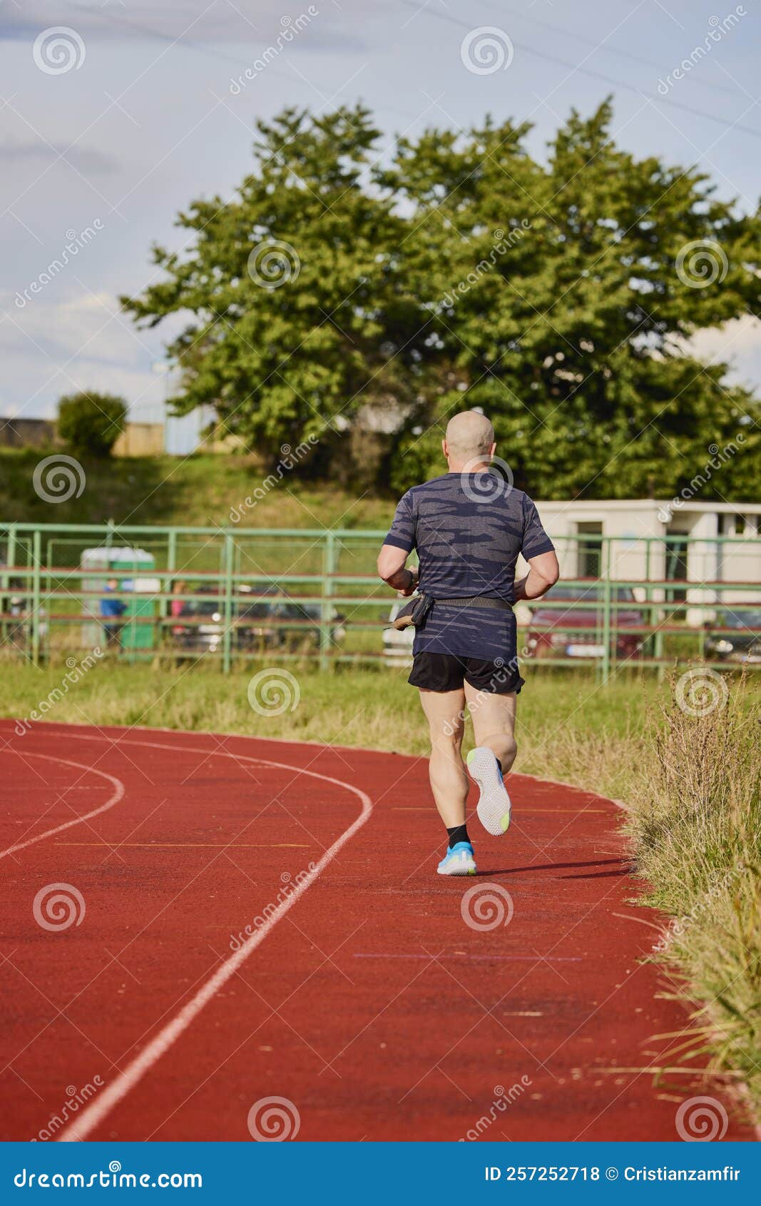 Man Running on a Running Track Stock Photo - Image of athletic, healthy ...