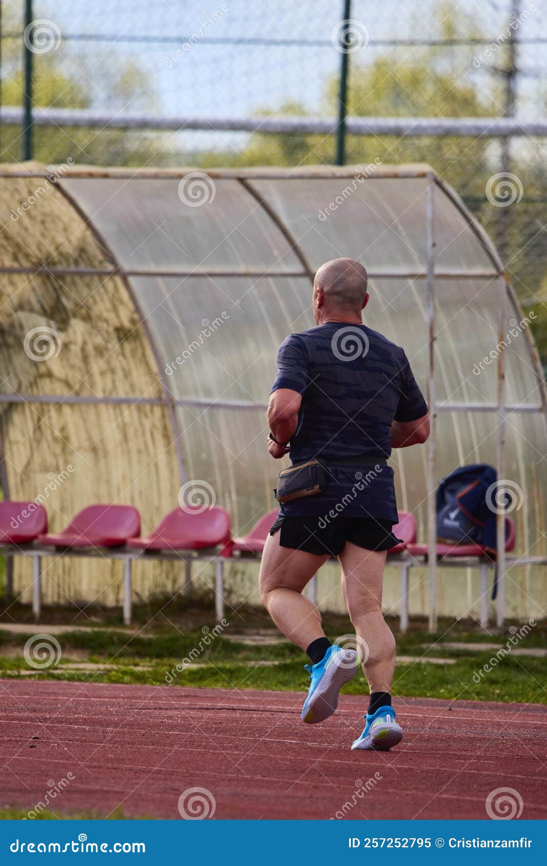 Man Running on a Running Track Stock Image - Image of exercise, people ...