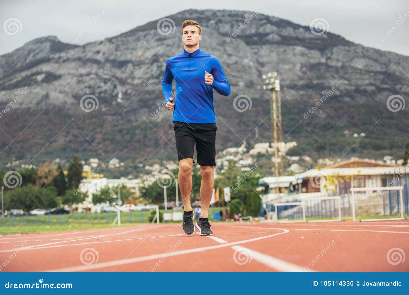 Man Running on a Running Track Stock Photo - Image of sport, marathon ...