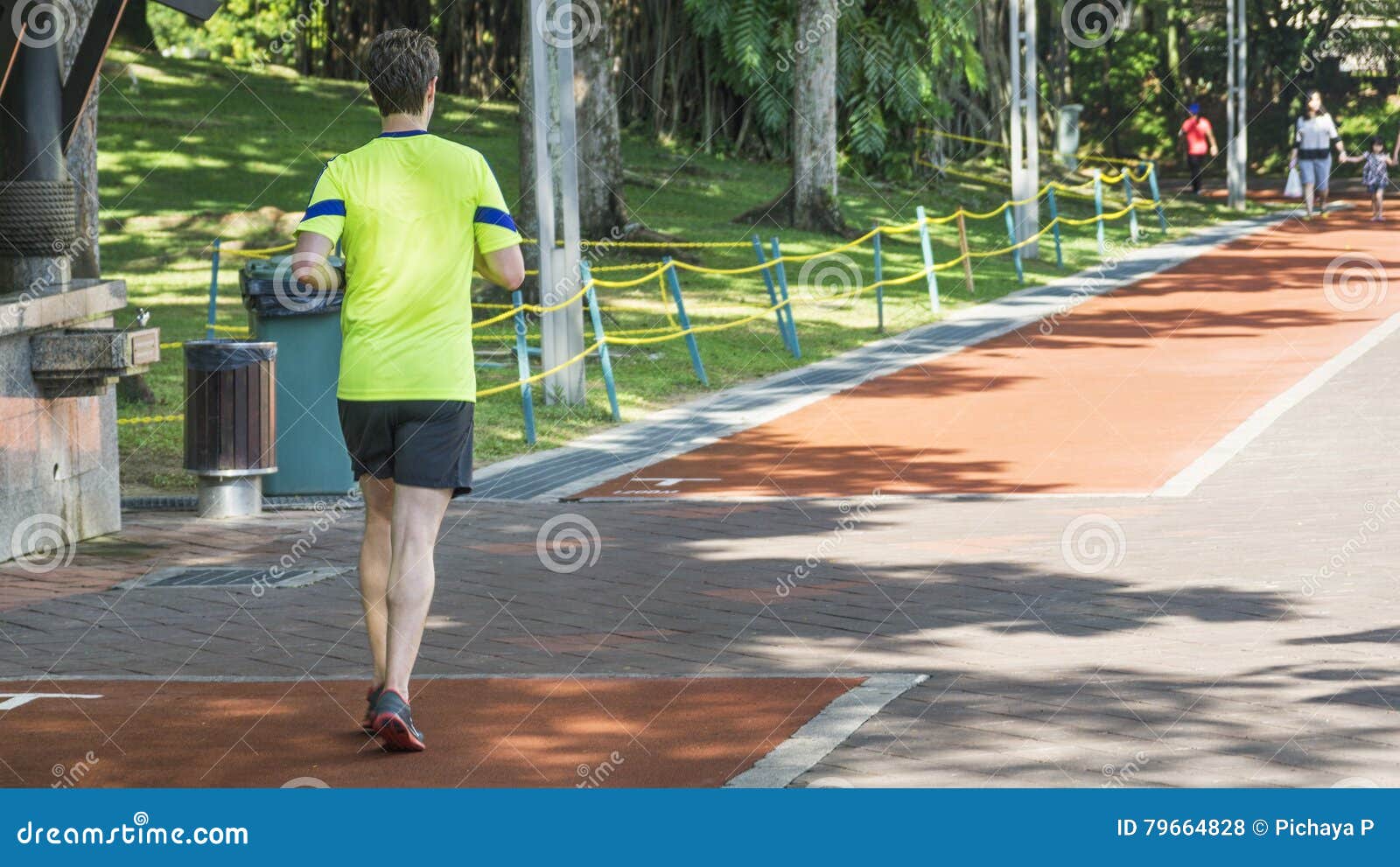 Man Running in the Running Way in the Garden Park. Editorial Stock ...