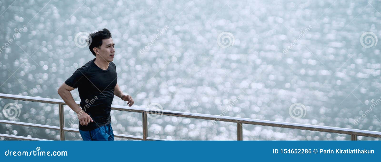 Man Running on the Street with a View of the River in the Morning Stock ...