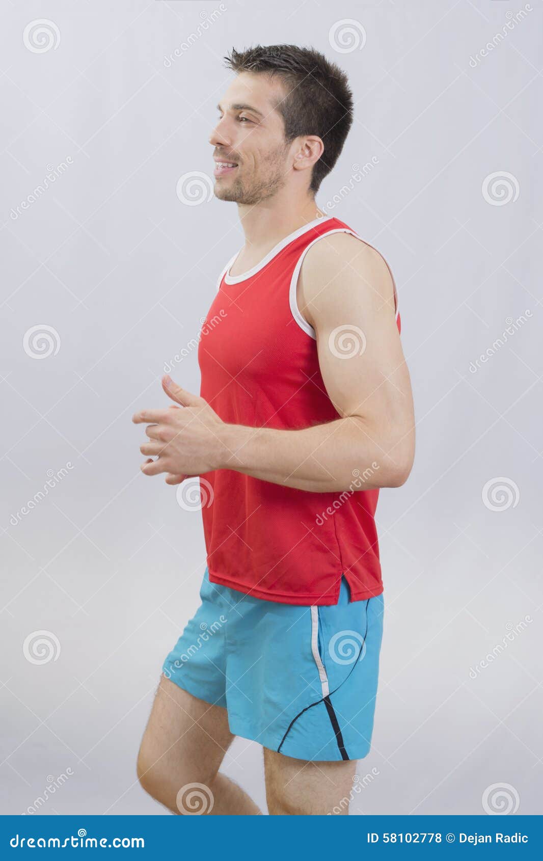 Man running in studio stock photo. Image of shape, hands - 58102778