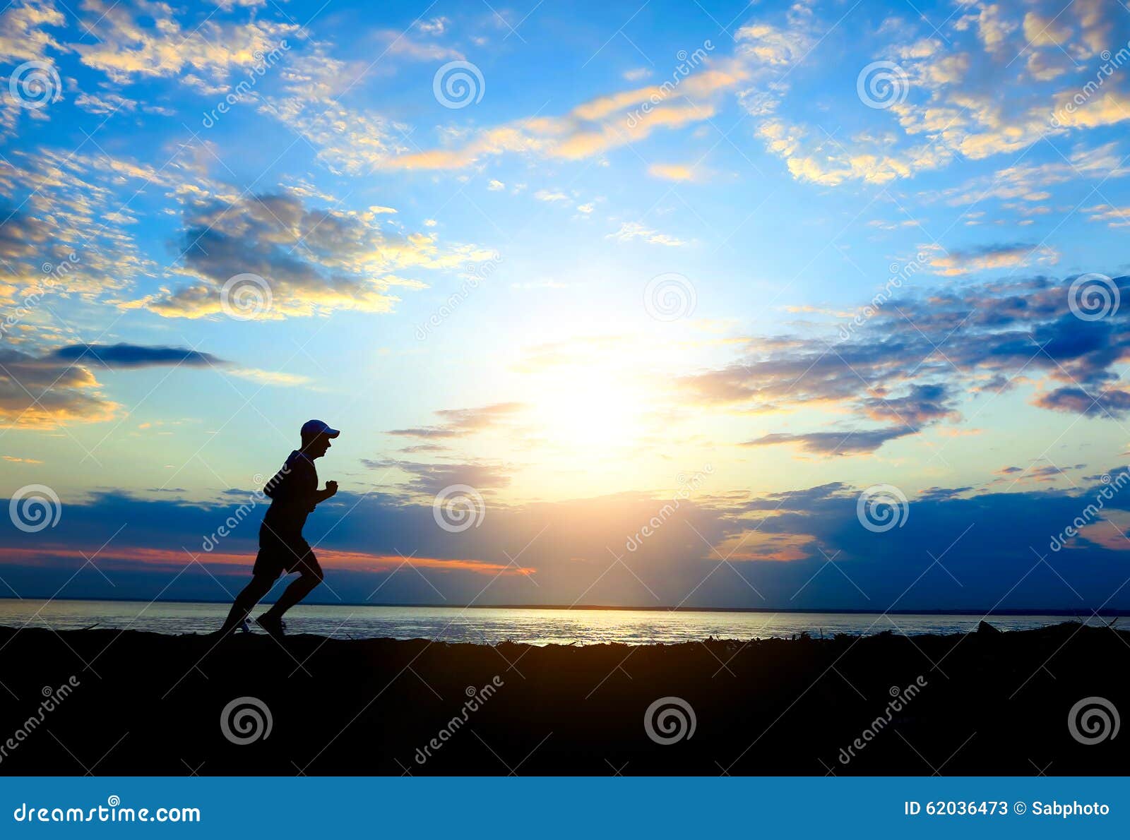 Man running at Sunset stock image. Image of race, rural - 62036473