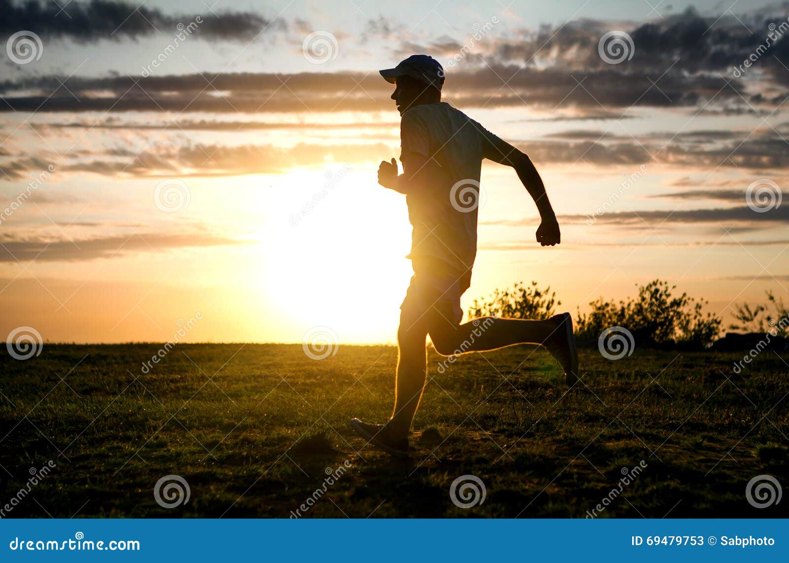Man running at Sunset stock image. Image of exercise - 69479753