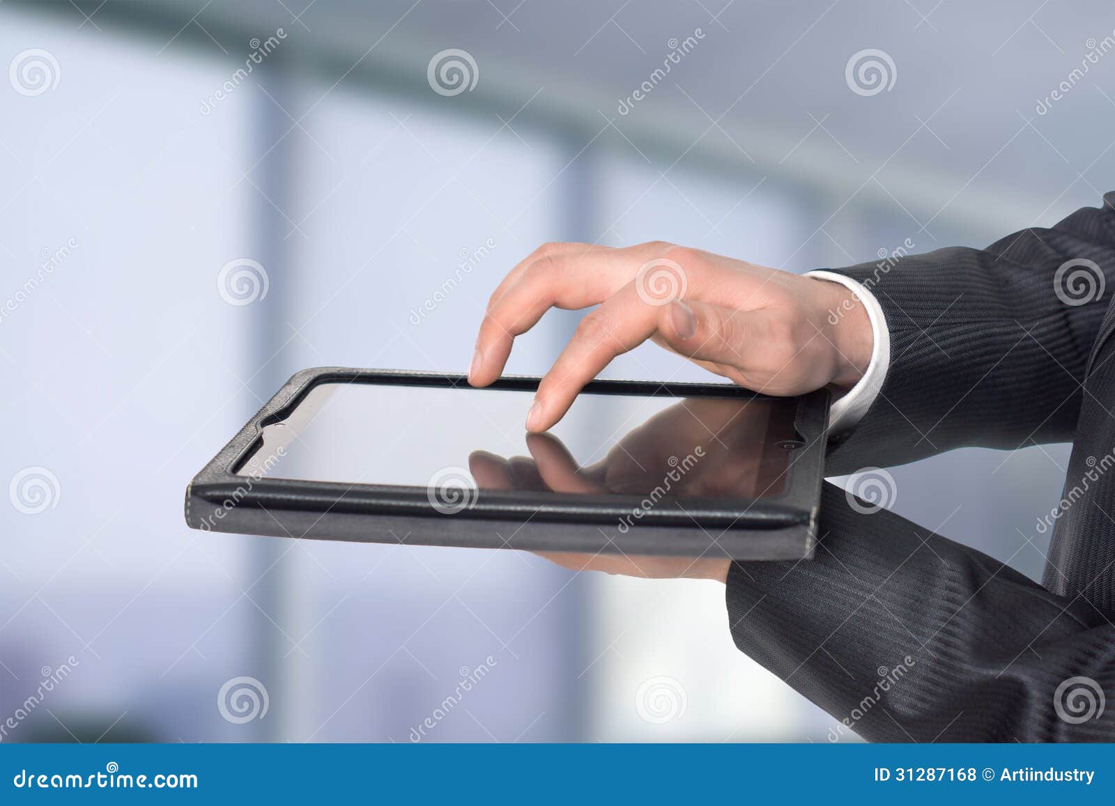 Man running on the tablet stock photo. Image of indoors - 31287168