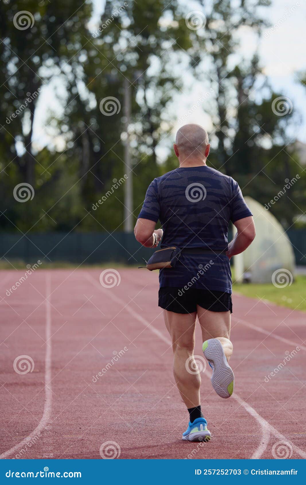 Man Running on a Running Track Stock Image - Image of motion, active ...