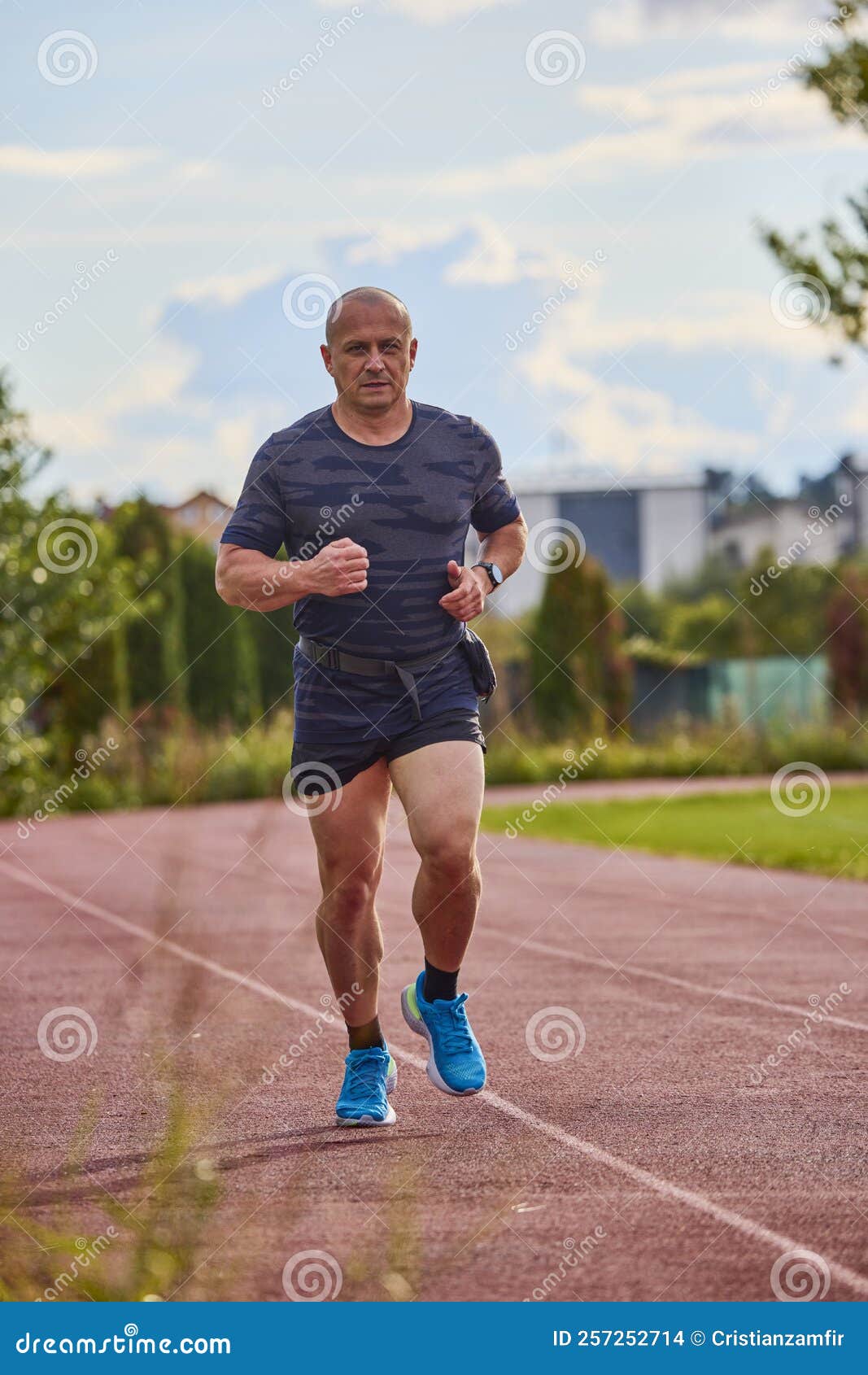 Man Running on a Running Track Stock Photo - Image of life, effort ...