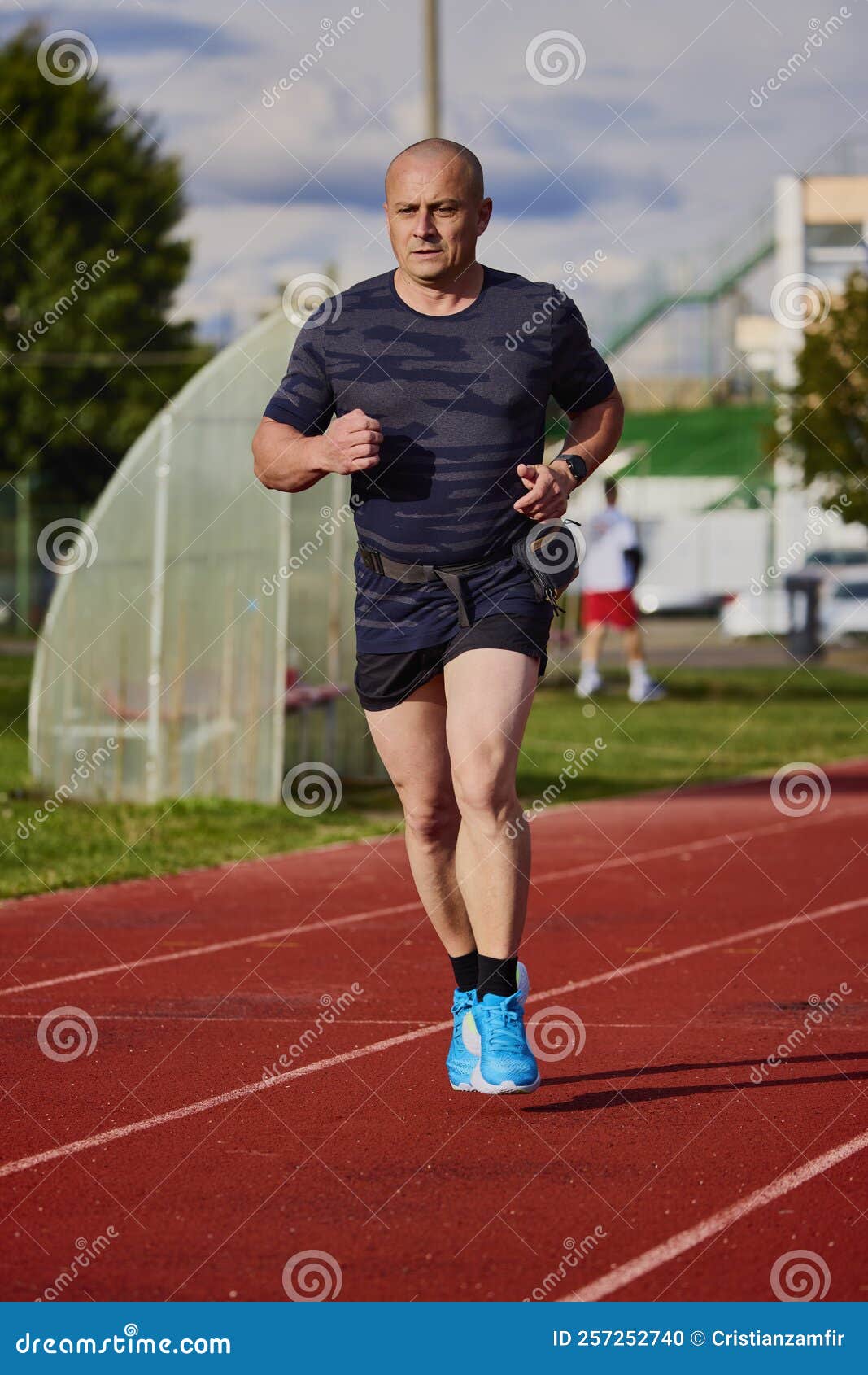 Man Running on a Running Track Stock Photo - Image of lifestyle, motion ...
