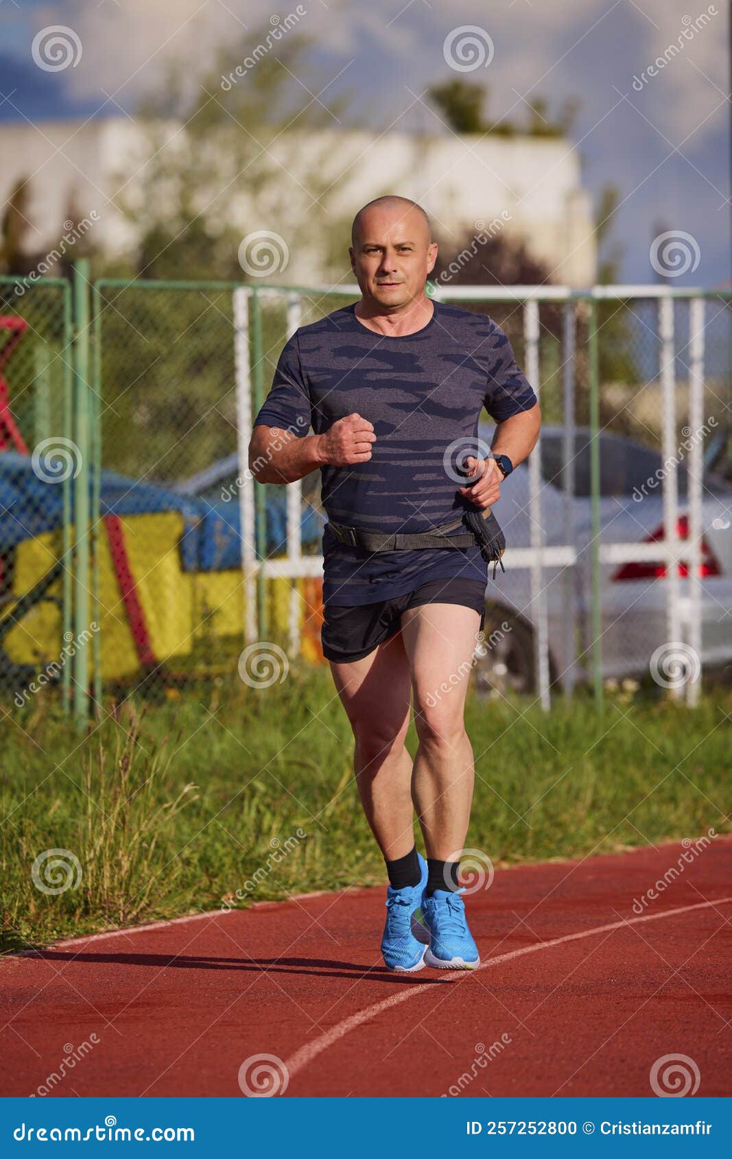 Man Running on a Running Track Stock Photo - Image of athletic, life ...