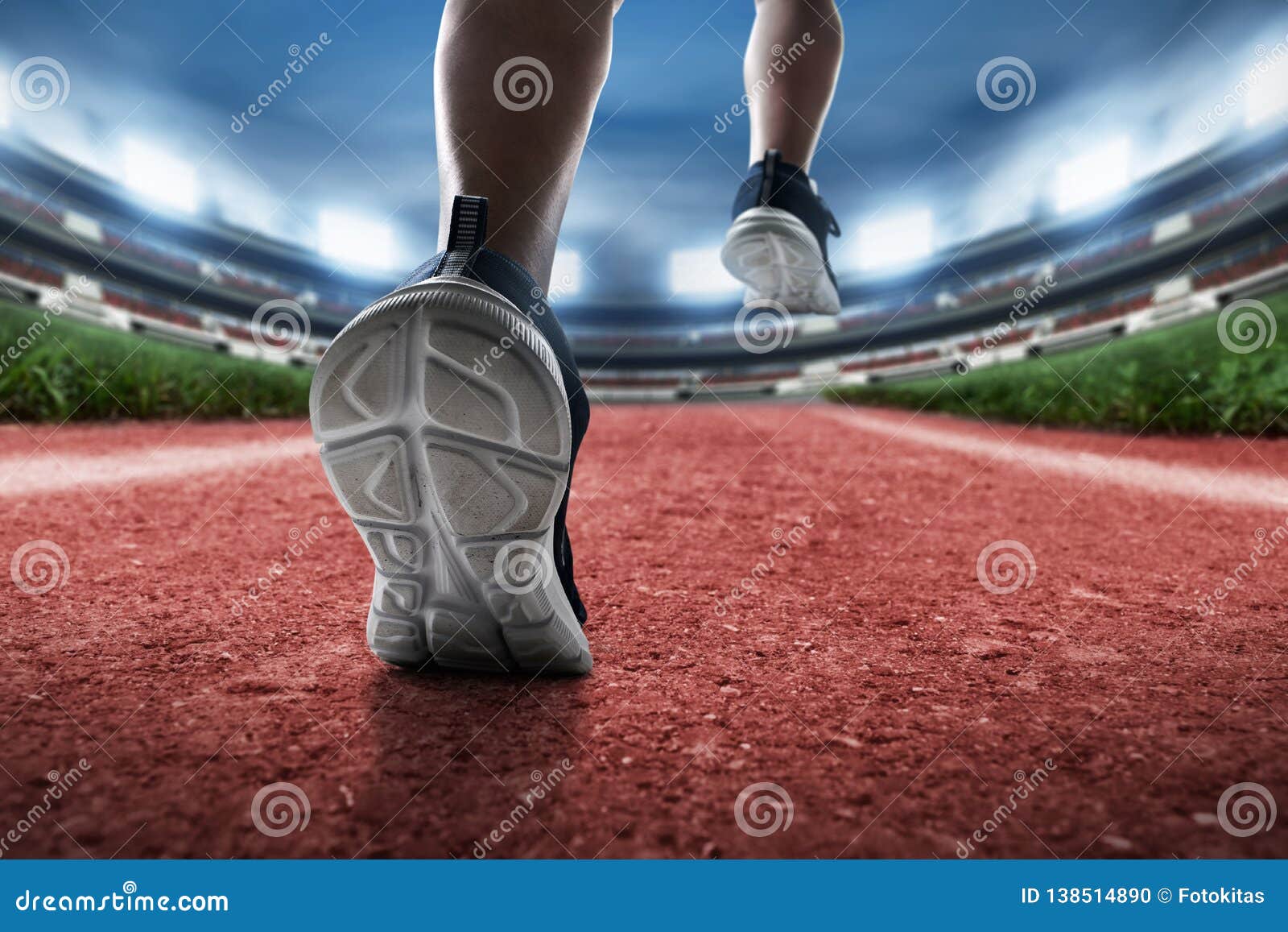 Man running on the track stock photo. Image of race - 138514890