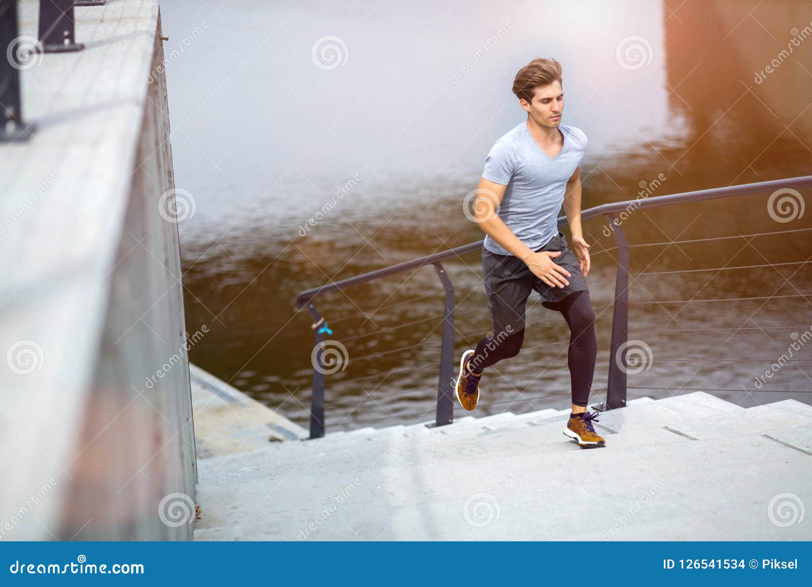 Man running in urban area stock photo. Image of jogging - 126541534