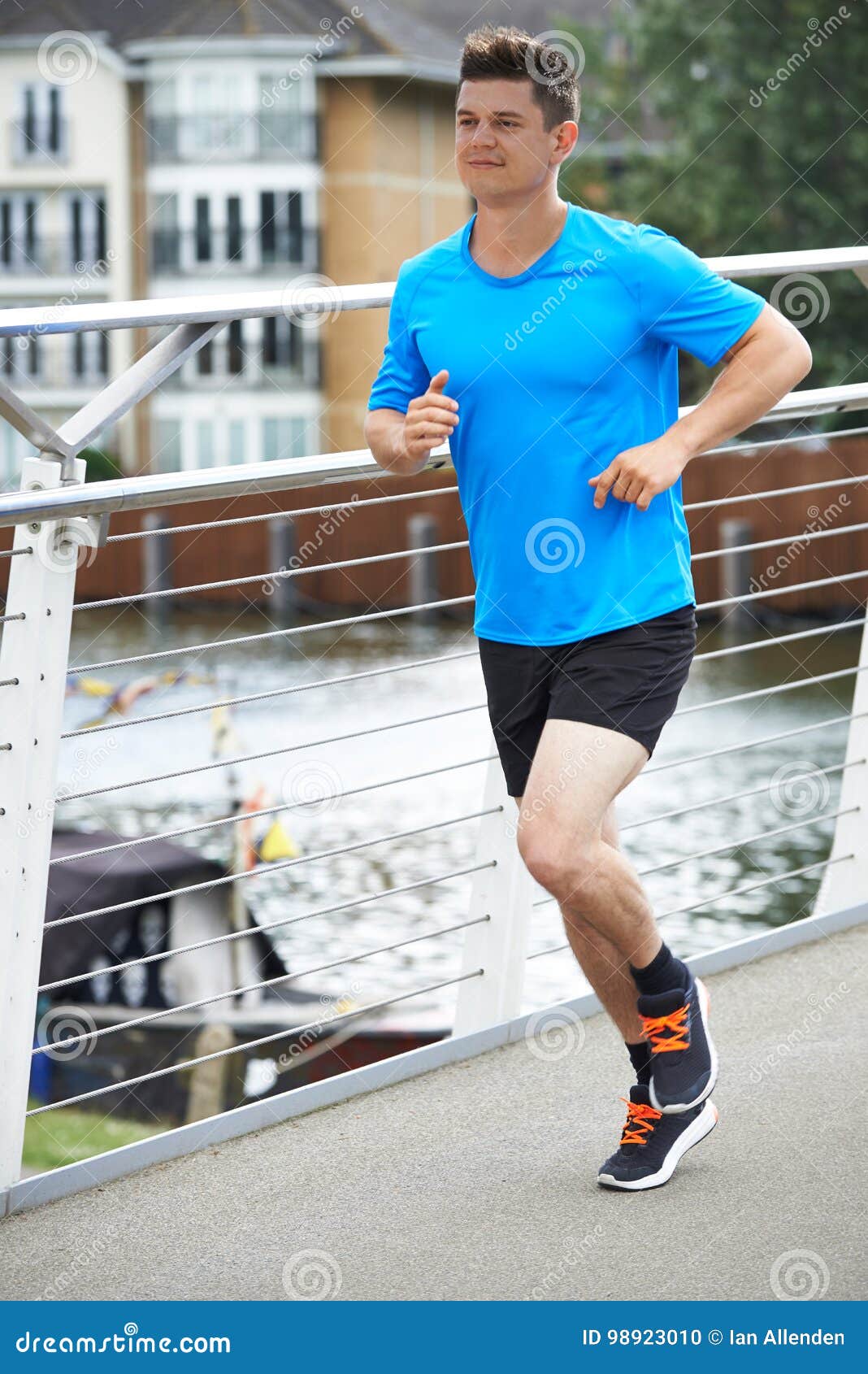 Young Man Running in Urban Environment Stock Photo - Image of training ...