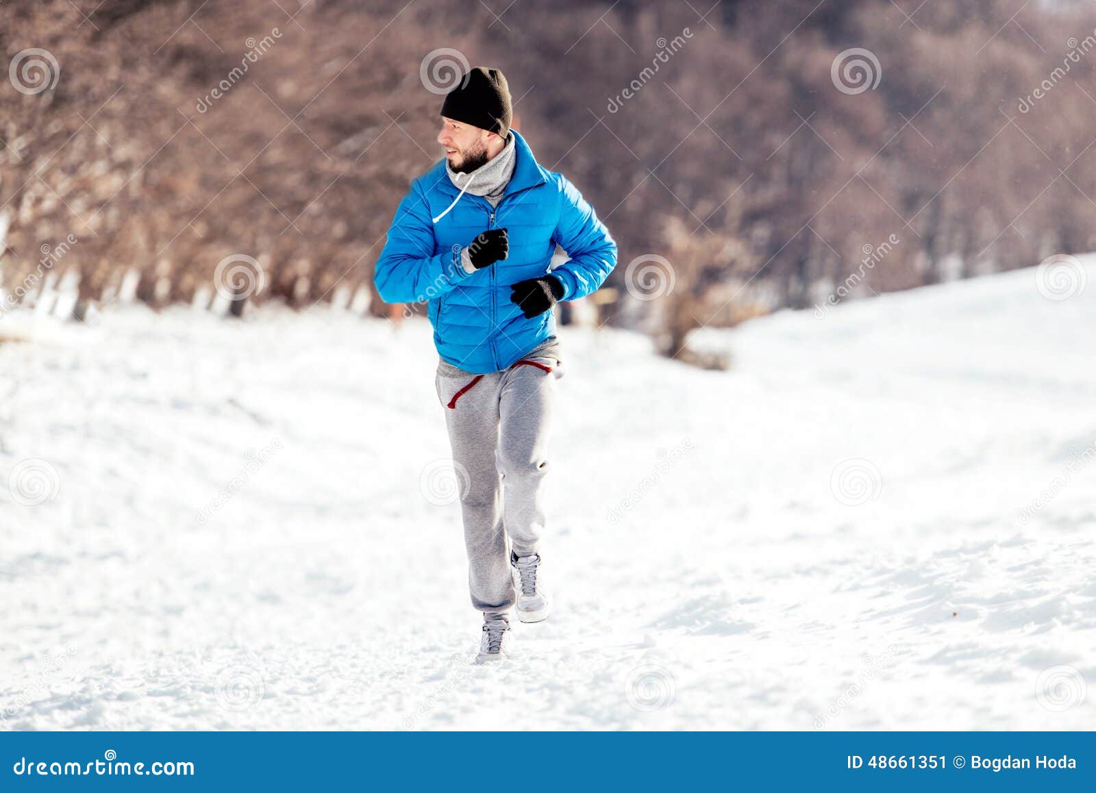 Man Running and Working Out on a Snowy Winter Day Stock Image - Image ...