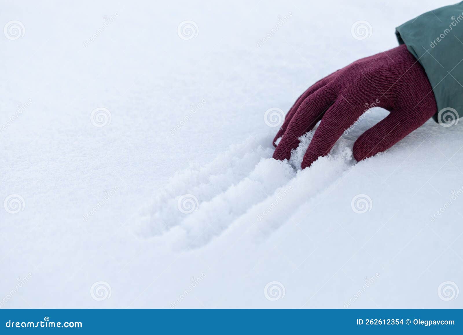 A Man Runs His Hand Over a Snow-covered Surface Stock Photo - Image of ...