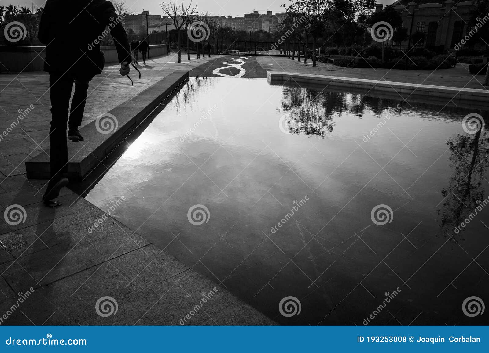 A Man Runs in a Hurry, Out of Focus for Sensation of Movement, in a ...