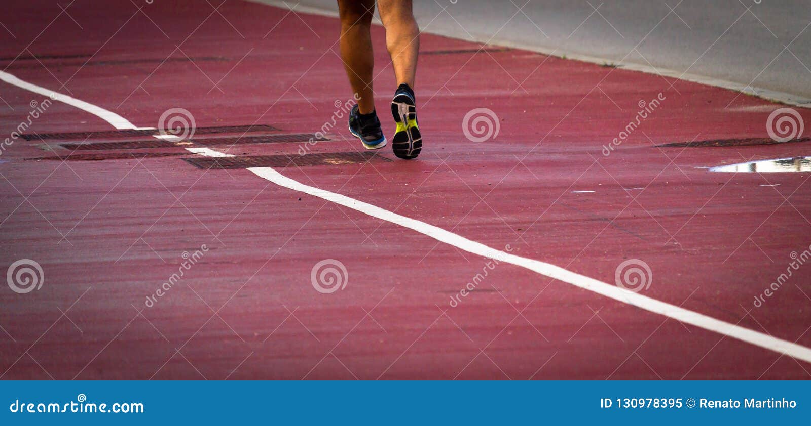 Runner`s Feet at the Track stock image. Image of body - 130978395