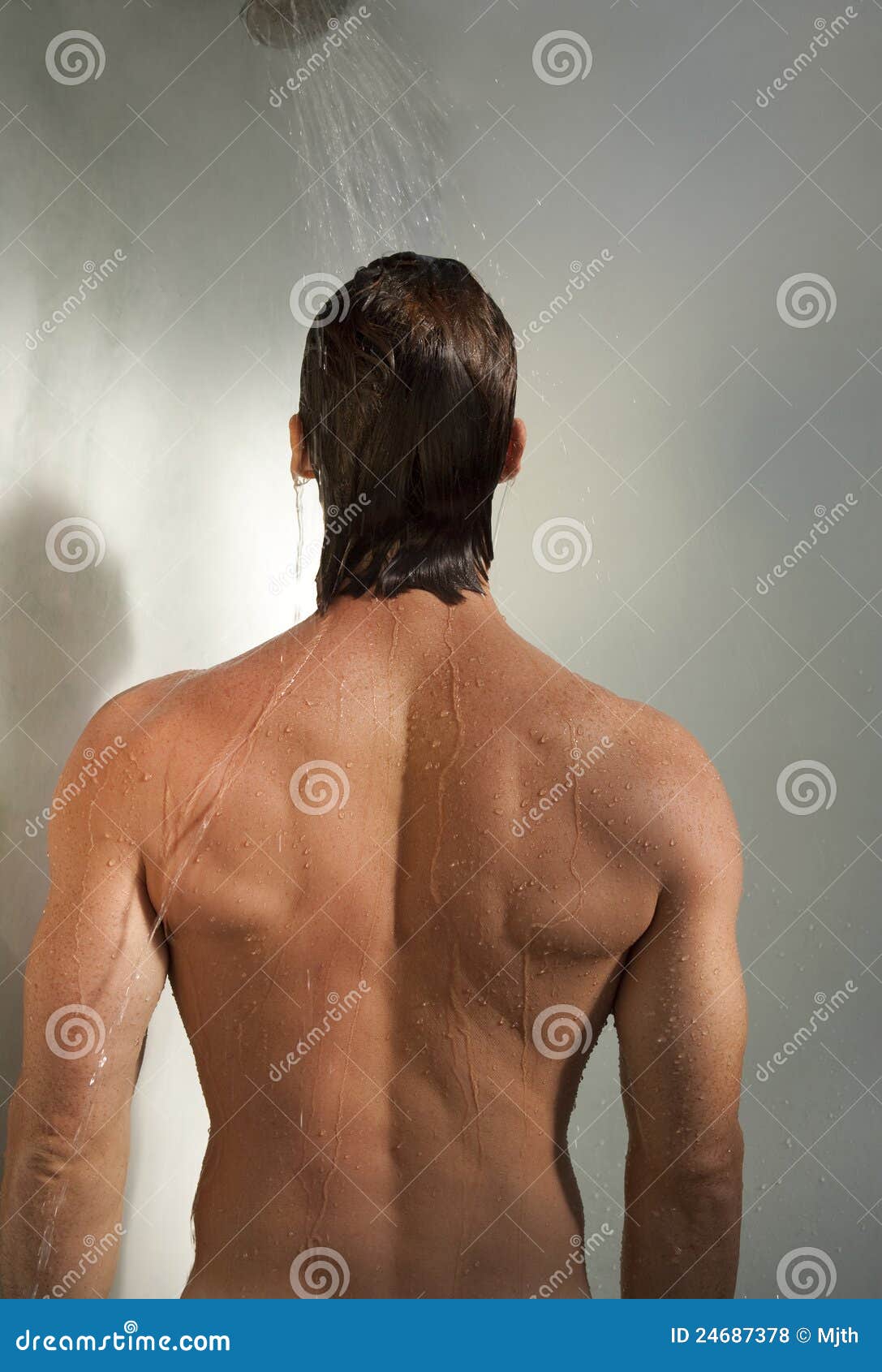 Man s Back Under Shower. stock photo. Image of falling - 24687378