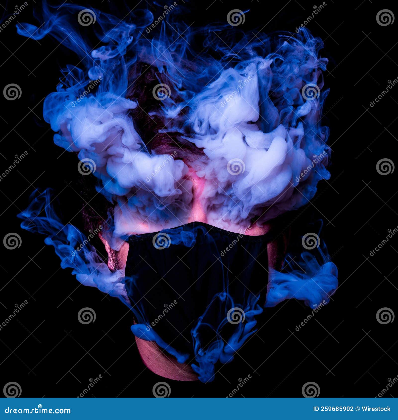 Man S Face in Blue Smoke Wearing Mask on Black Background Stock Photo ...