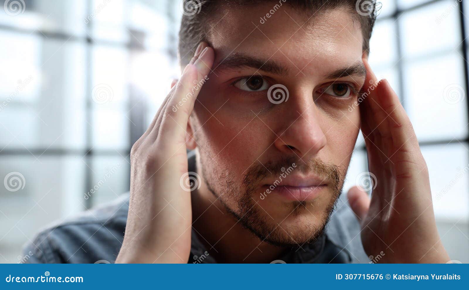 The Man S Face is in Close-up, he is Tired and Has a Headache Stock ...