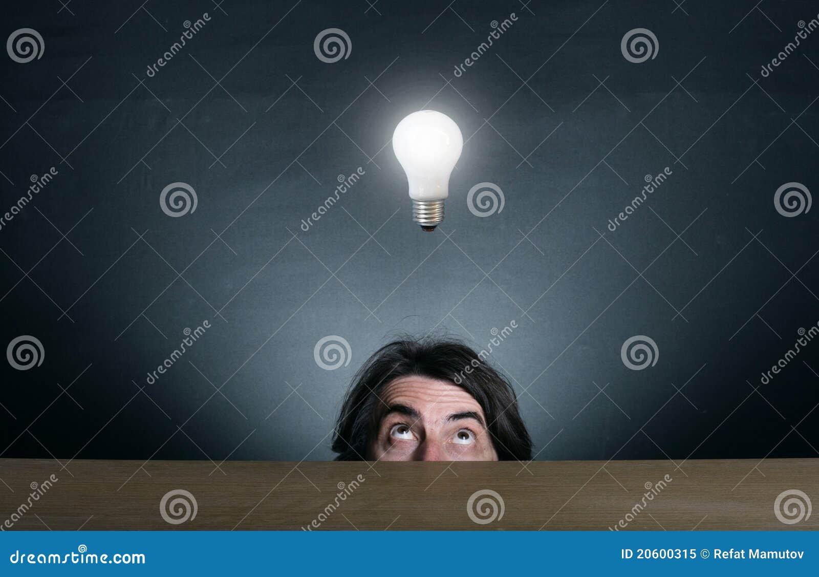 Man S Face Looking at the Light Bulb. Stock Image - Image of eyes ...