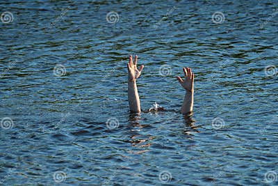 A Man`s Hand Above the Surface of the Water in the River, Saving ...