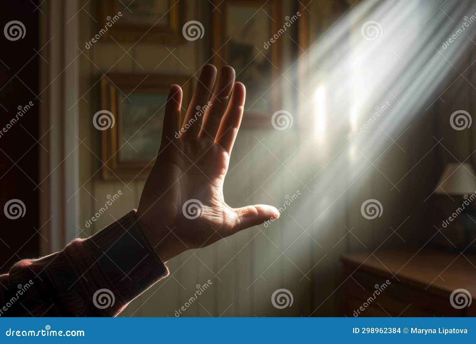 Man& X27;s Hand with a Beam of Light Shining through the Window. Stock ...