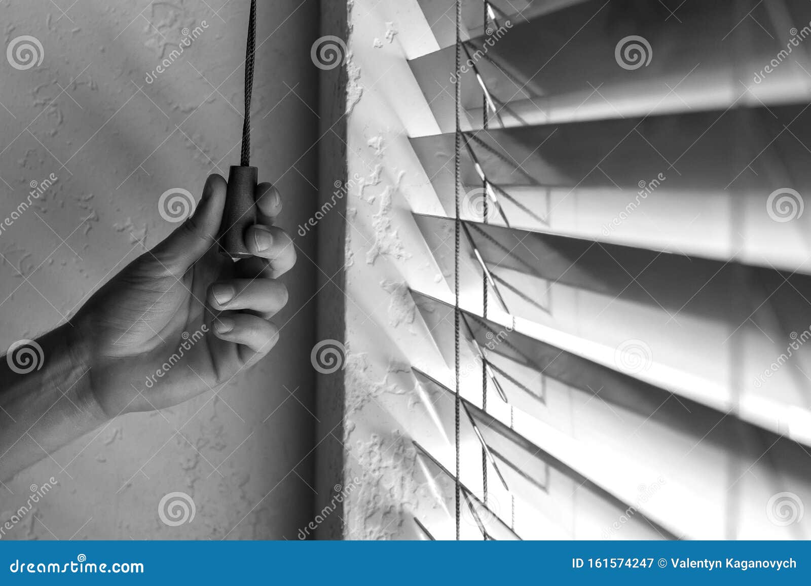 Man`s hand and blinds stock image. Image of left, stripes - 161574247
