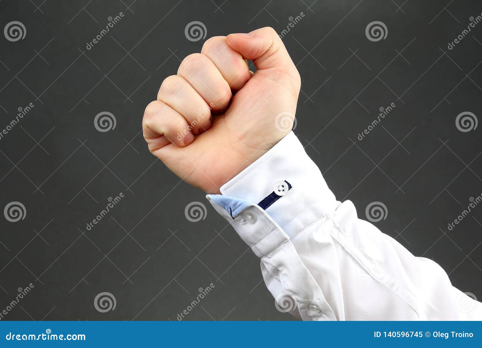 Man`s Hand Clenched into Fist Stock Image - Image of showing, people ...