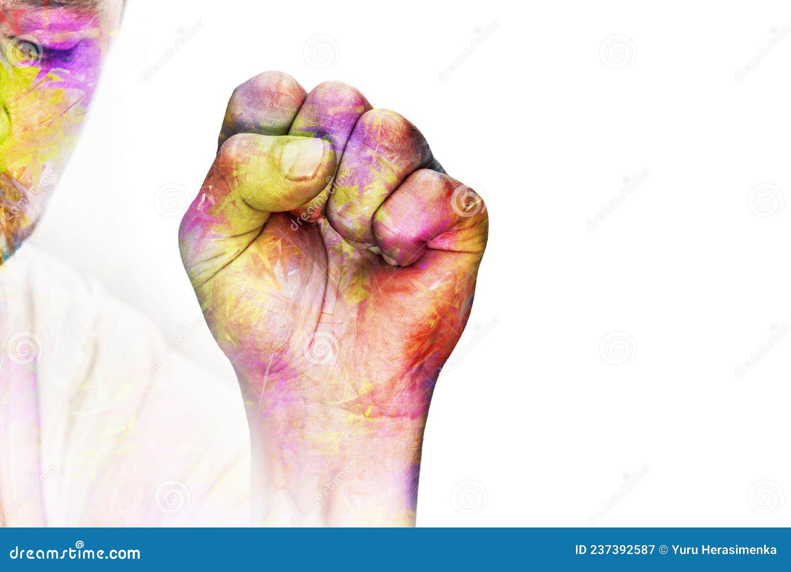 A Man`s Hand Is Clenched Into A Fist With The Lgbt Rainbow Flag The