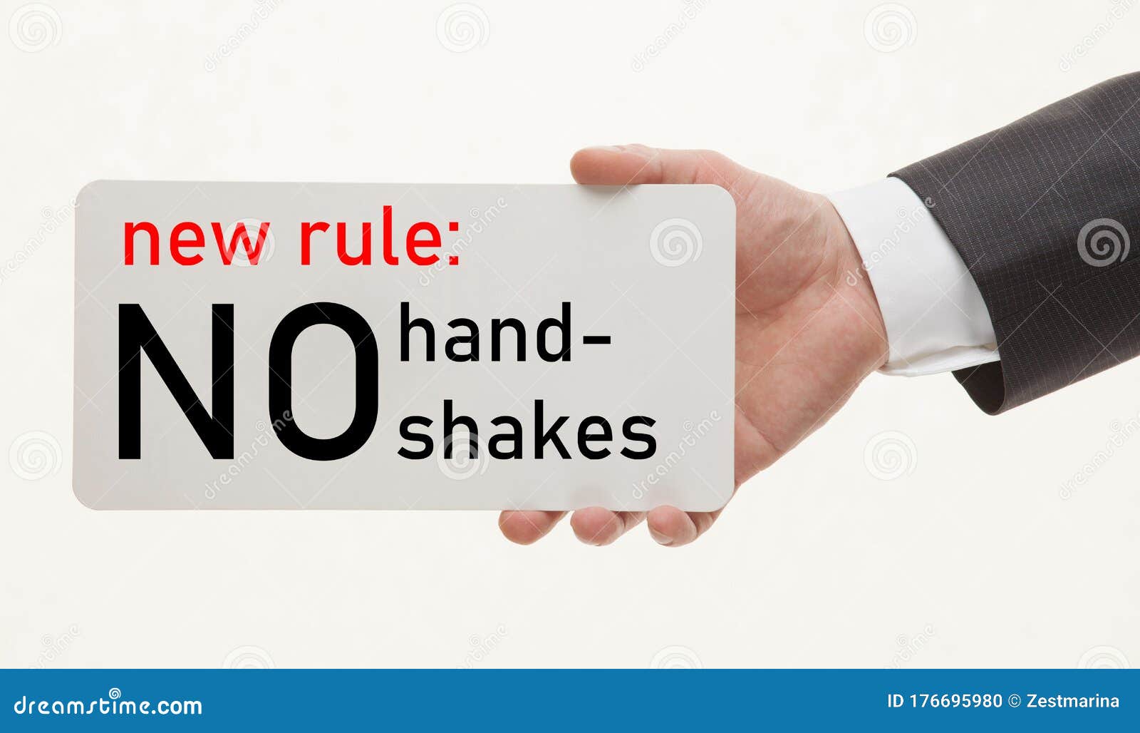 Man`s Hand Demonstrates a Reminder To Avoid Handshakes Stock Photo ...