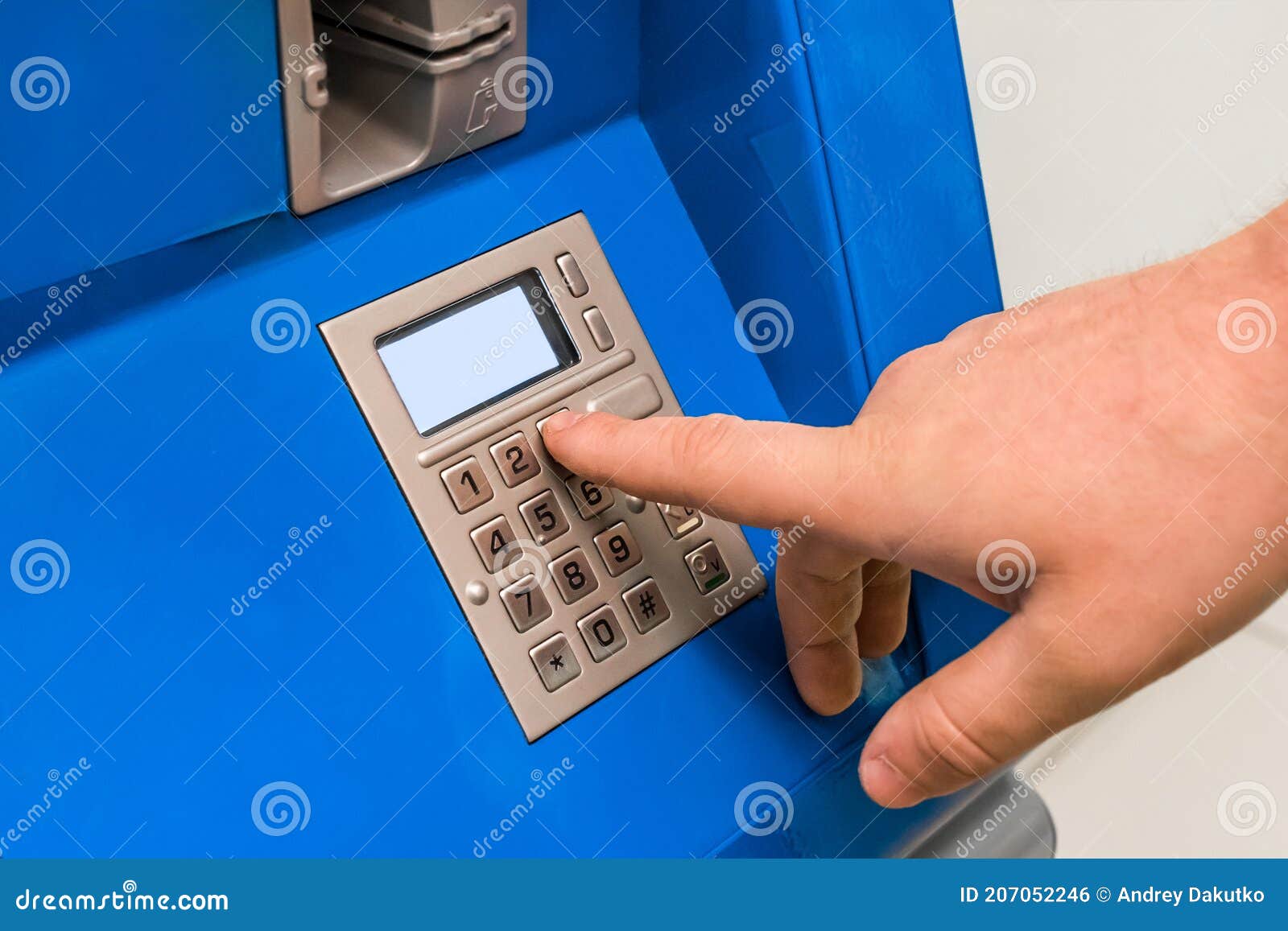 A Man`s Hand Dials a Pincode at the Terminal for Issuing Money, Close ...