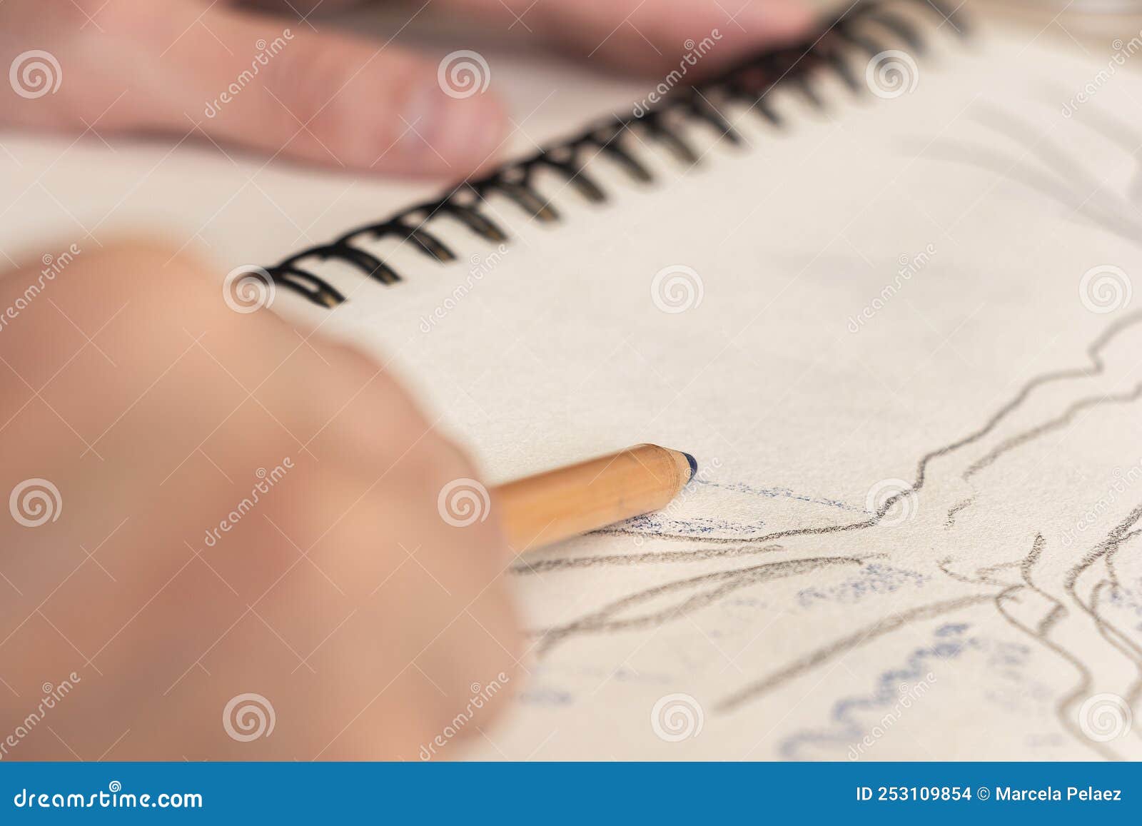 Man`s Hand Drawing with a Colored Pencil Stock Photo - Image of ...
