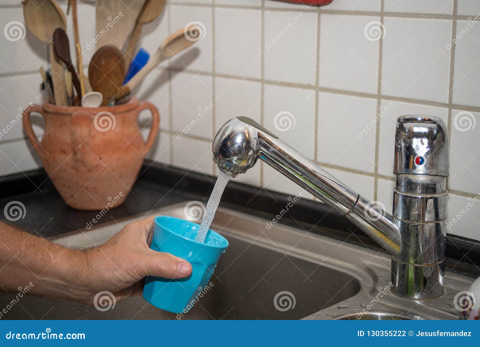 Man filling cup stock photo. Image of liquid, cold, clean - 130355222