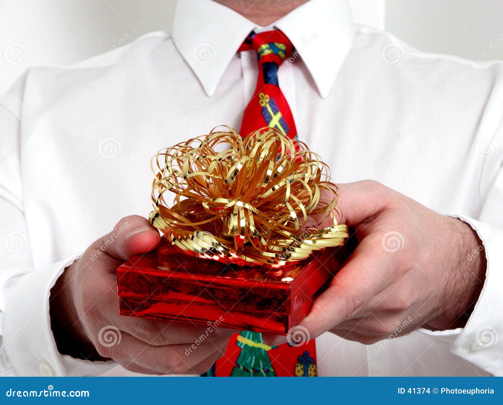 Man S Hand Giving a Christmas Gift Stock Photo - Image of gift, give: 41374