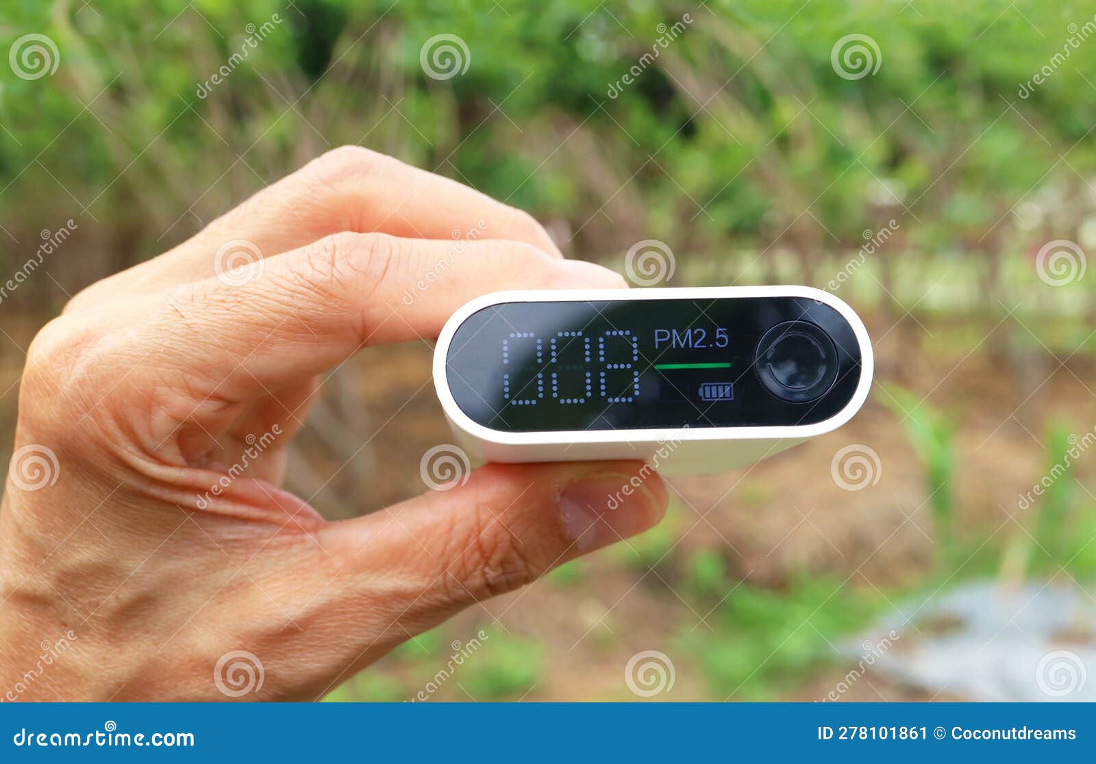 Hand Holding an Air Pollution Sensor Measuring Air Quality in the ...