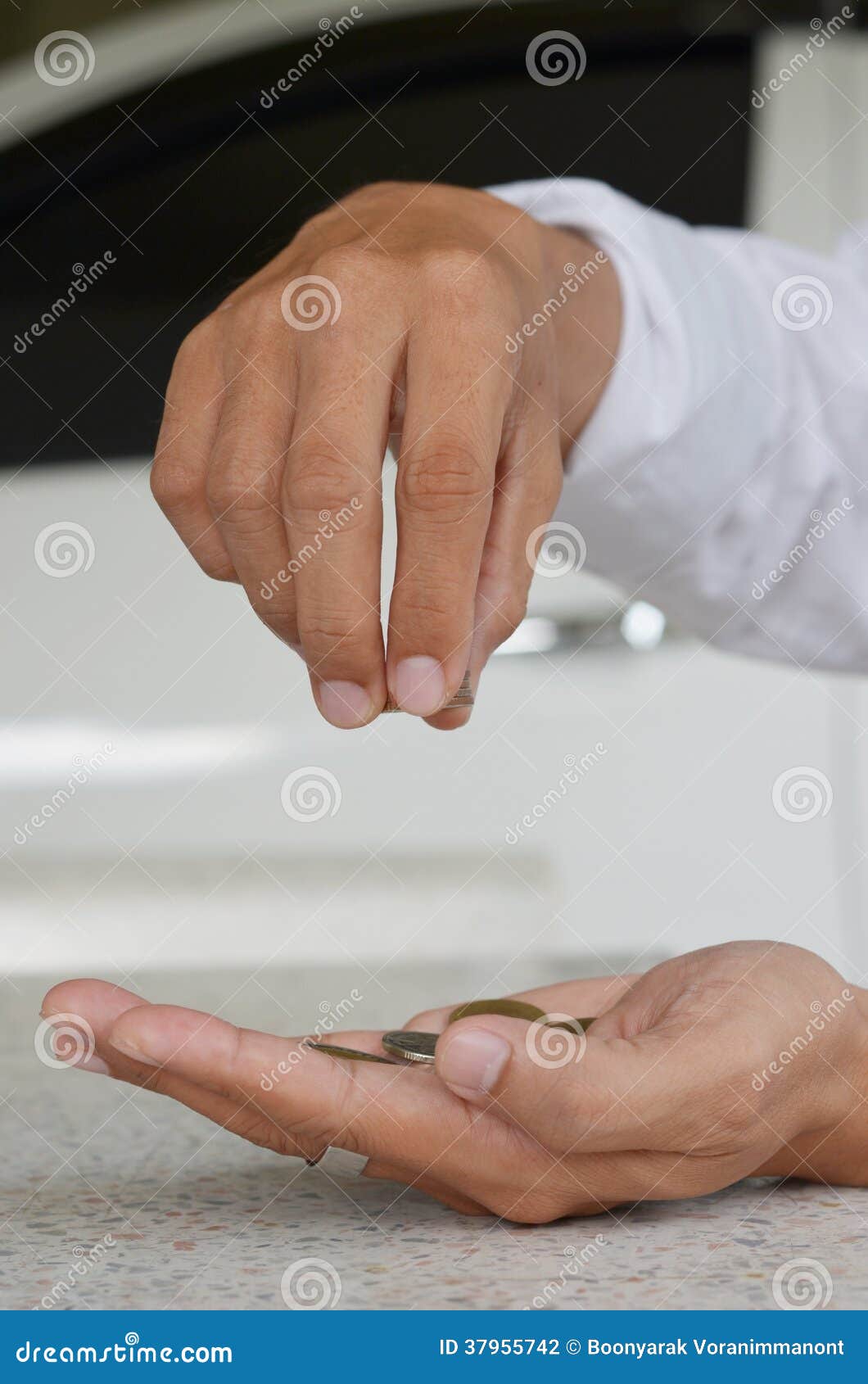 Man s hand, holding 2 coin stock photo. Image of exchange - 37955742