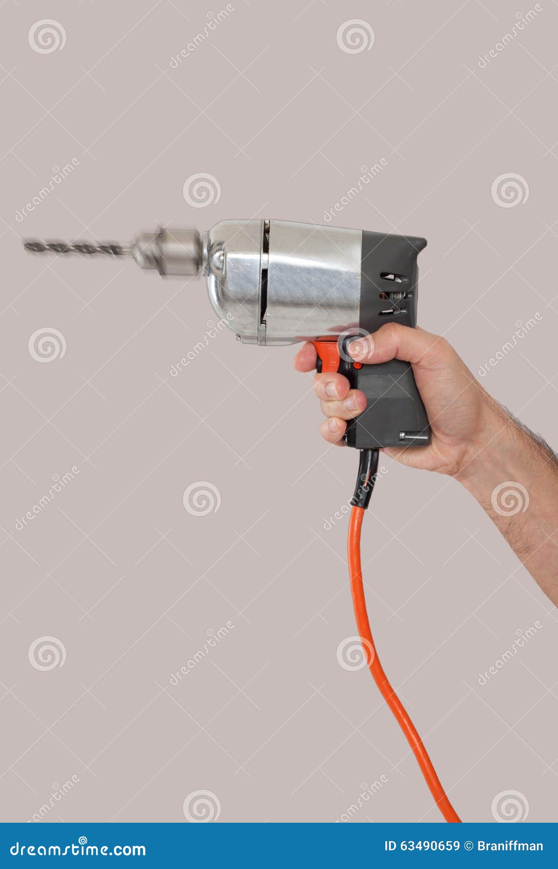 Man s hand holding a drill stock image. Image of driver - 63490659