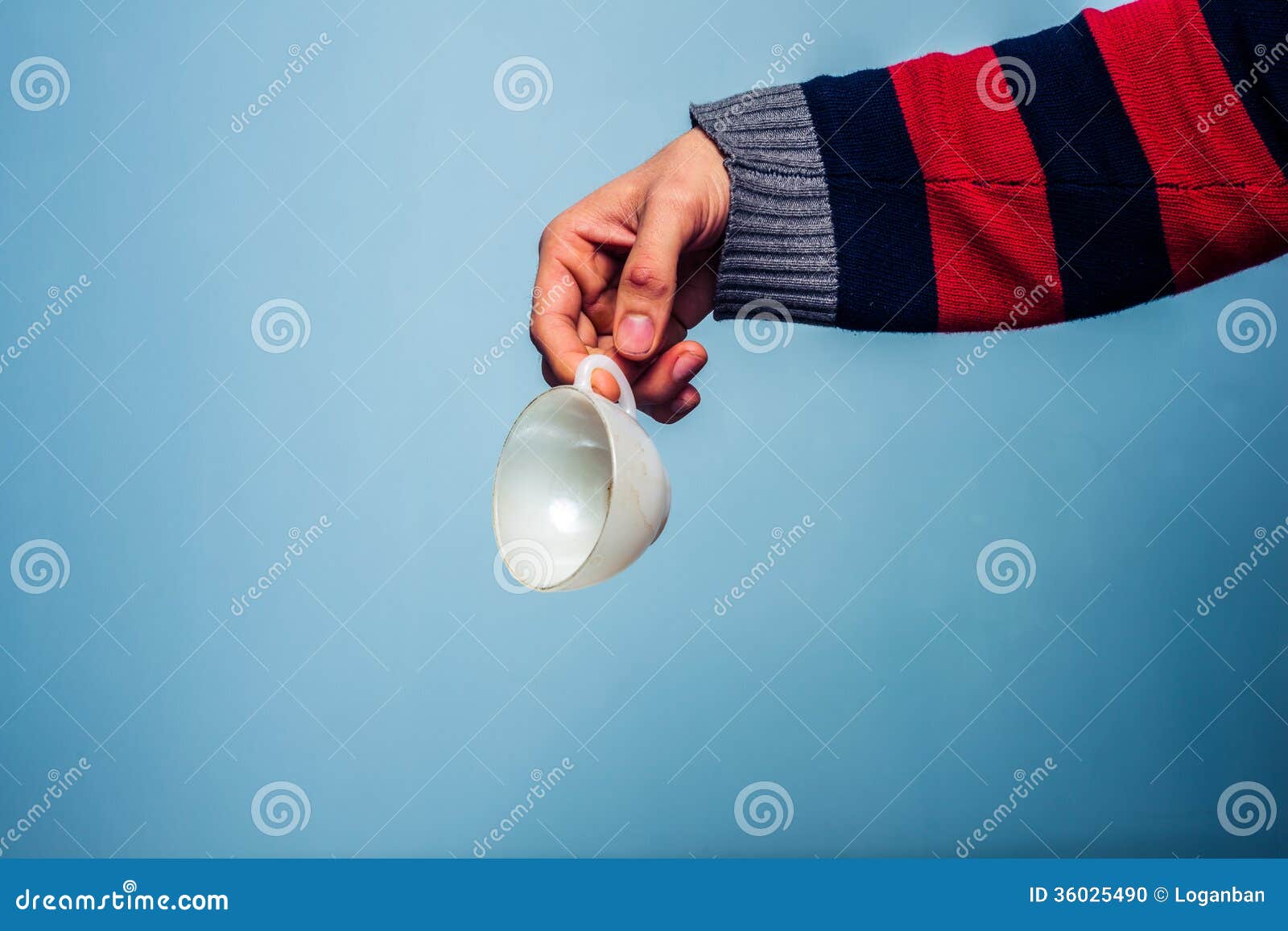 Man S Hand Holding Empty Cup Stock Photo - Image of pour, hand: 36025490
