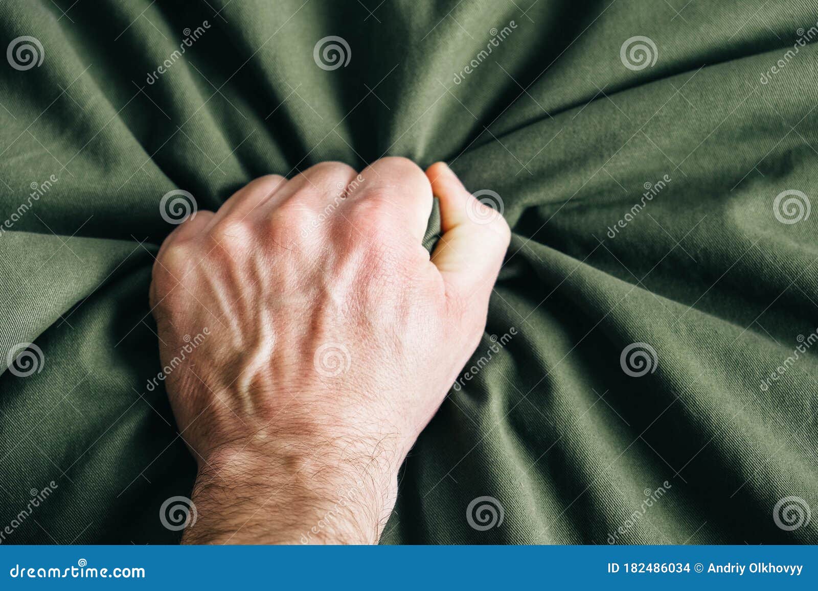 Man`s Hand Holding a Green Fabric. Top View Stock Photo - Image of dawn ... Man`s Hand Holding a Green Fabric. Top View Stock Photo - Image of dawn ...