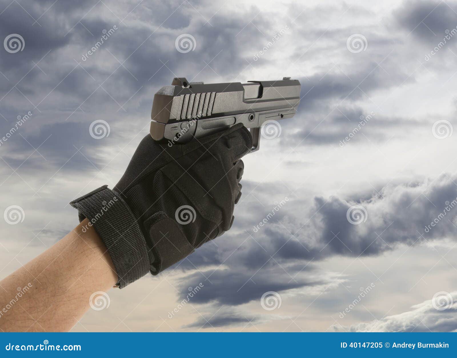 Man s hand holding gun stock image. Image of aiming, hand - 40147205