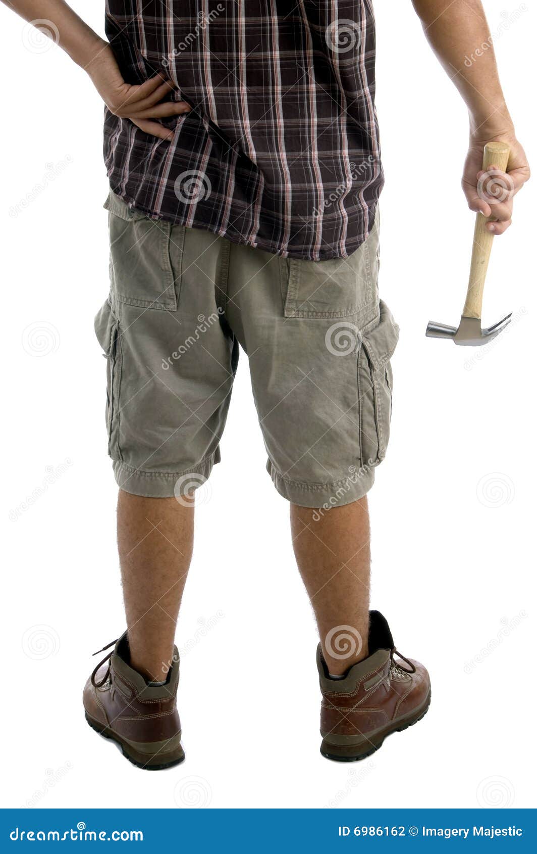 Man s hand holding hammer stock photo. Image of object - 6986162