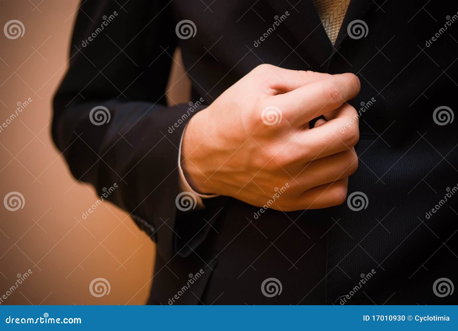 Man s hand holding jacket stock photo. Image of gray - 17010930