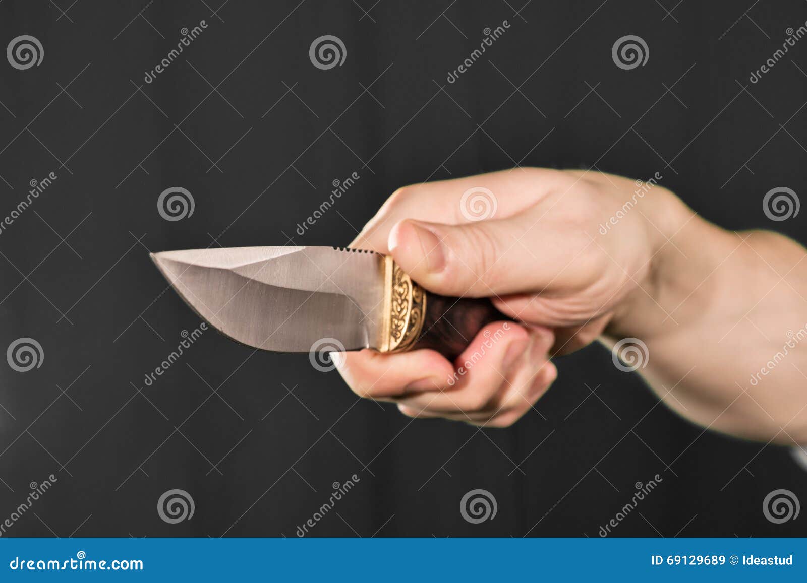 Man s hand holding knife stock image. Image of human - 69129689